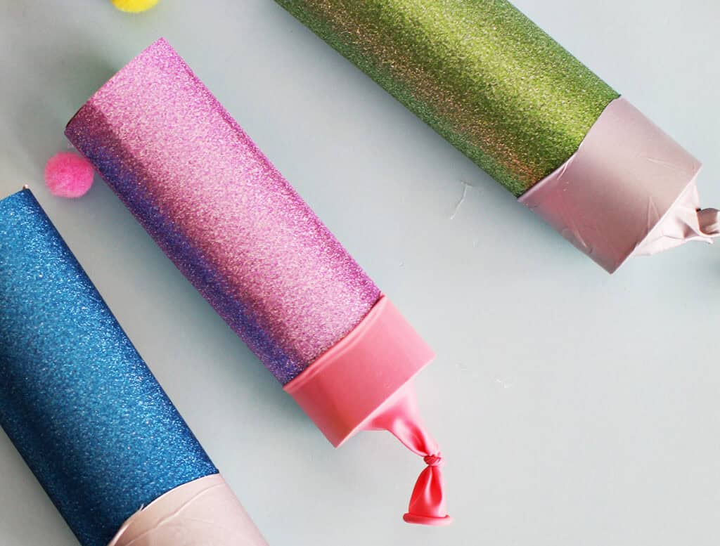 DIY Pom Pom Popper for Kids- Easy Craft and STEM Fun - Childhood Magic