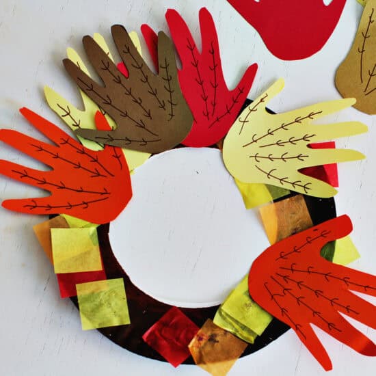 Fall Handprint Wreath Craft with Paper Plate - Childhood Magic