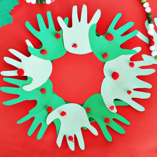 Christmas Handprint Wreath Craft - Childhood Magic