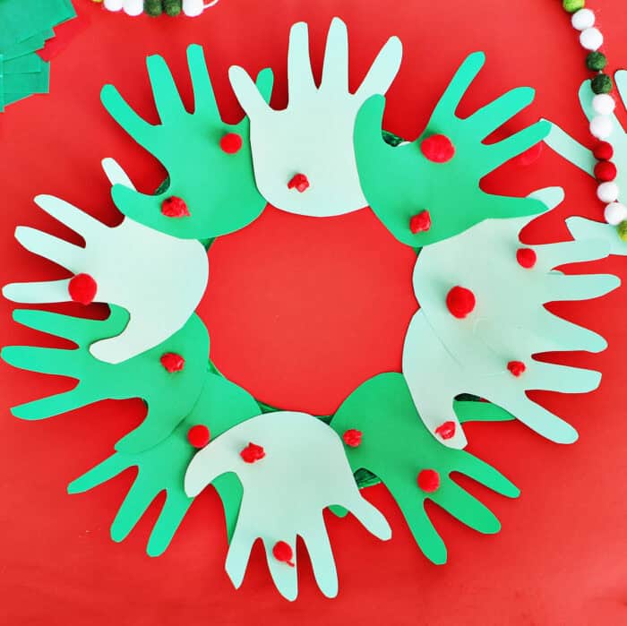 Christmas Handprint Wreath Craft - Childhood Magic