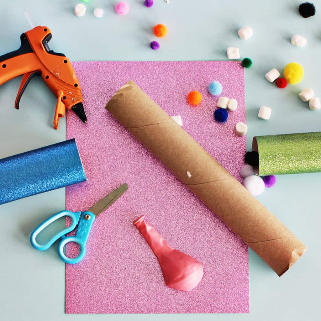 DIY Pom Pom Popper for Kids- Easy Craft and STEM Fun - Childhood Magic